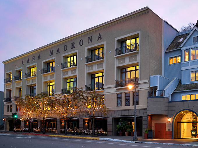 Casa Madrona glows at twilight, promising luxurious slumber with dreams enhanced by the day's seaside memories.