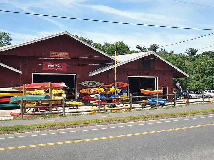 Kayaks lined up like a rainbow of adventure possibilities. This isn't just outdoor recreation &ndash; it's therapy you can paddle.