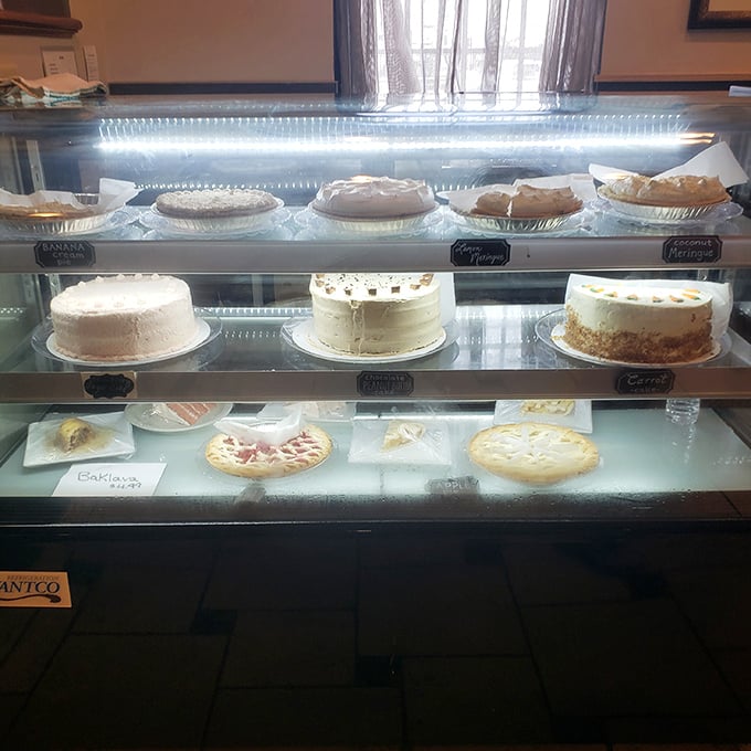 A dessert case that should come with a warning label: "Willpower not included." Those cakes aren't just baked&mdash;they're engineered for happiness.