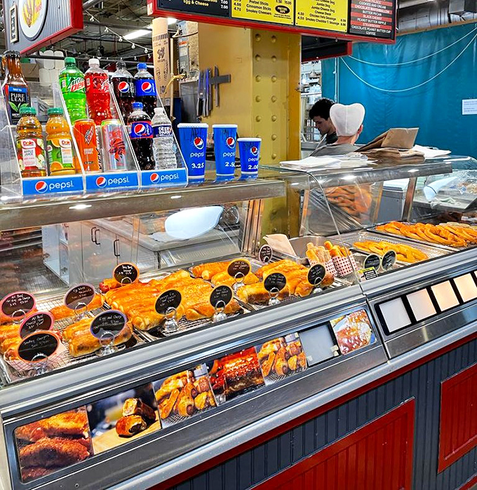 The display case showcasing rows of pretzel creations that make window shopping suddenly feel like actual torture.