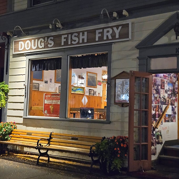 The Krebs' welcoming porch, adorned with hanging plants and American flag, promises an evening of culinary delight in historic surroundings.