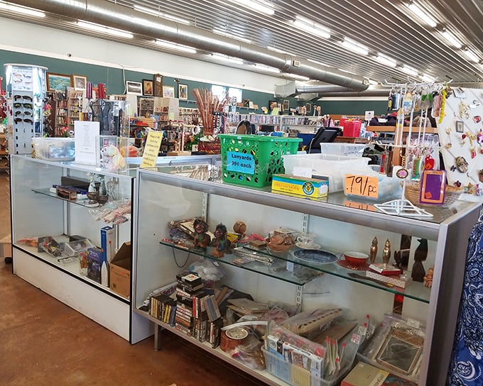 Glass display cases housing treasures both practical and peculiar &ndash; the jewelry counter of secondhand dreams.