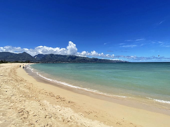 Kanaha Beach Park offers that postcard-perfect shoreline without the resort crowds &ndash; just golden sand, blue water, and Maui's mountains.