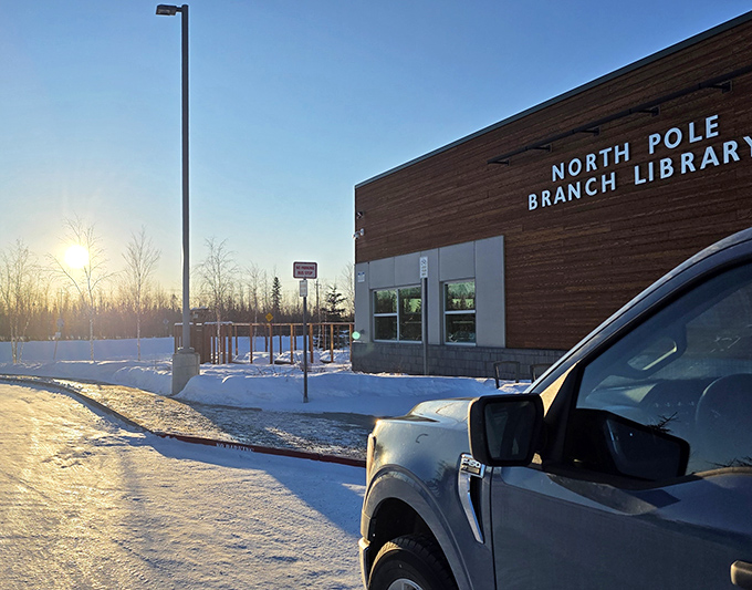 The North Pole Branch Library stands as a beacon of knowledge against the winter landscape, proving that even Santa's neighbors need good books.