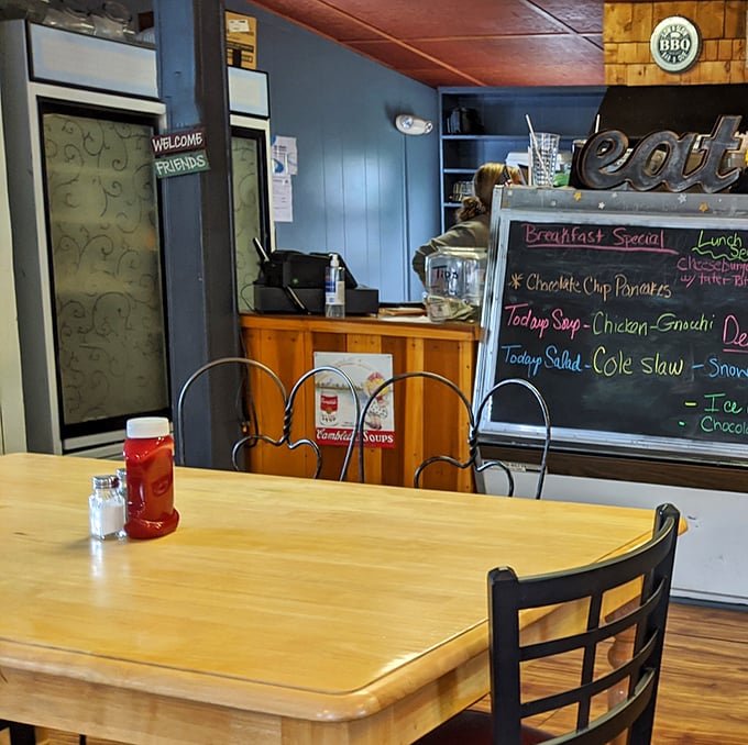 Where breakfast dreams become reality&mdash;a chalkboard announcing specials like breaking news and a "Welcome Friends" sign that actually means it.