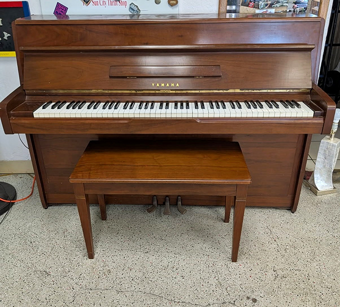 This Yamaha piano isn't just furniture—it's waiting for fingers to bring it back to life. Imagine the sonatas it's played and the Christmas carols it knows.