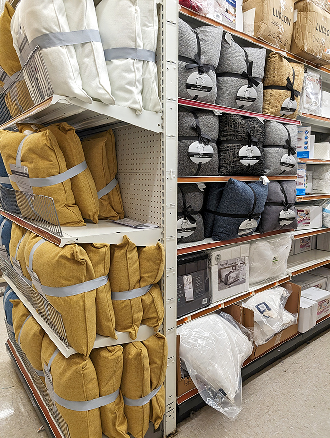 Pillow paradise in every color and texture imaginable. Touch-testing encouraged, spontaneous napping frowned upon but understandable.