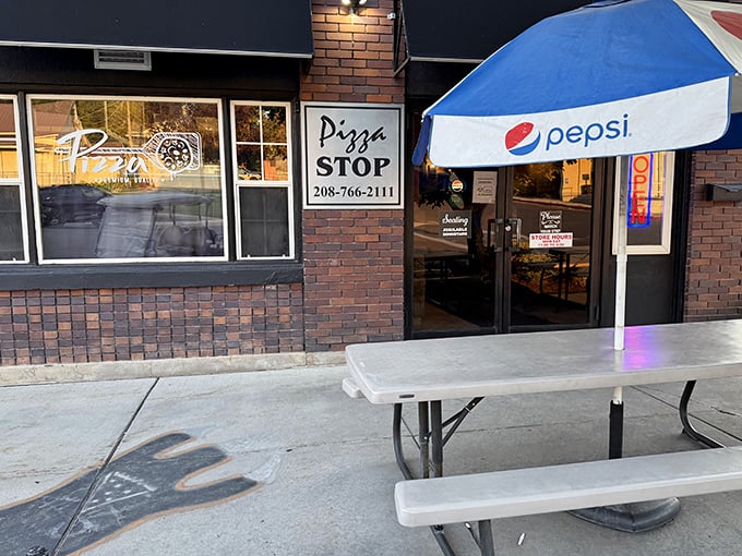 Pizza Stop's outdoor bench isn't fancy, but it's where locals share slices and stories under the big Idaho sky—no reservation app needed.