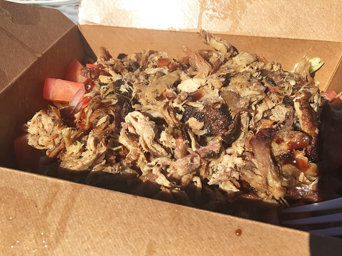 Pulled pork that looks like it had a proper introduction to smoke before landing in that box. The bark bits are like finding treasure.