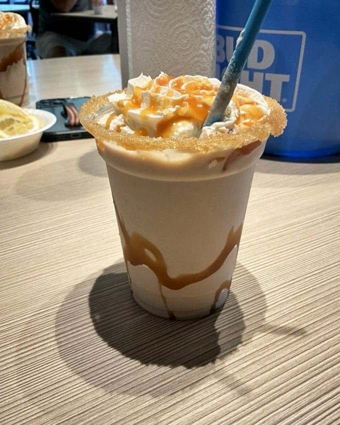 This isn't just a milkshake—it's a caramel-drizzled work of art that makes adults remember why dessert was always worth behaving for.