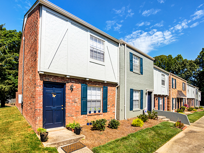 Tidy townhomes with manicured lawns represent Winston-Salem's affordable housing options, where first-time buyers and downsizers alike find right-sized living spaces.