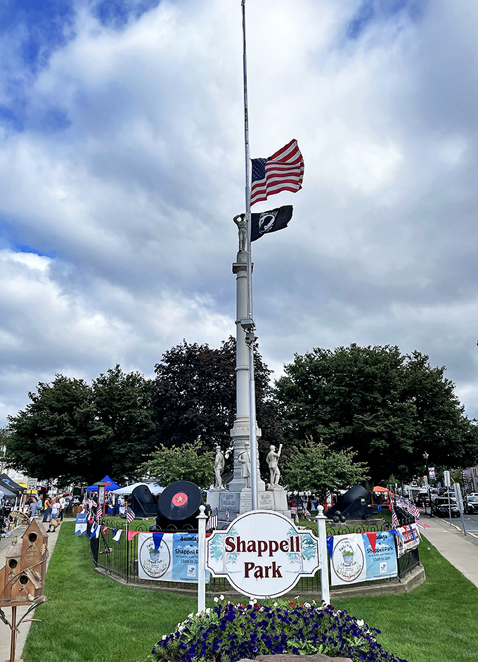 The Soldiers and Sailors Monument stands tall in Shappell Park, surrounded by community festivities that honor both history and hometown pride.