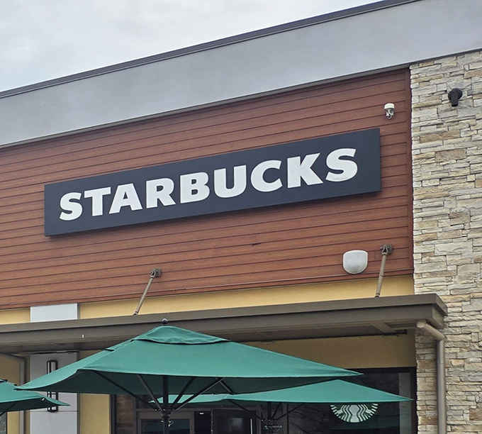 Starbucks provides the essential fuel station for marathon shoppers who understand that bargain hunting is an endurance sport.