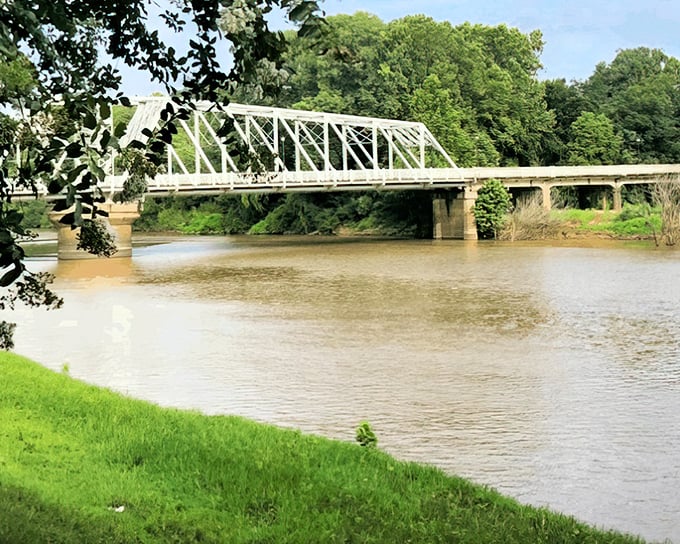 The Tallahatchie River flows peacefully past Greenwood, offering scenic views that don't require an expensive cruise ship ticket to enjoy.