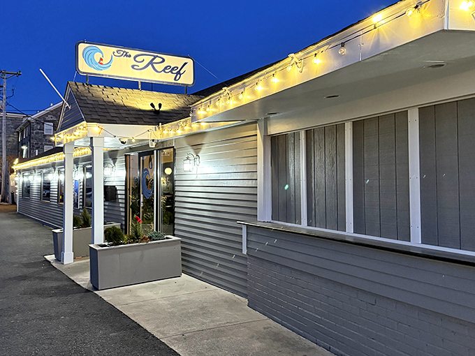 The Reef glows with promise as evening descends. This unassuming spot beckons with the siren song of seafood and cocktails after a day of coastal exploration.