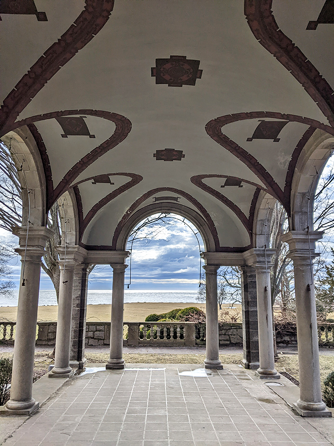 The pergola's elegant arches frame Long Island Sound like a Renaissance painting&mdash;"Ocean View Through Connecticut Columns" by Mother Nature.