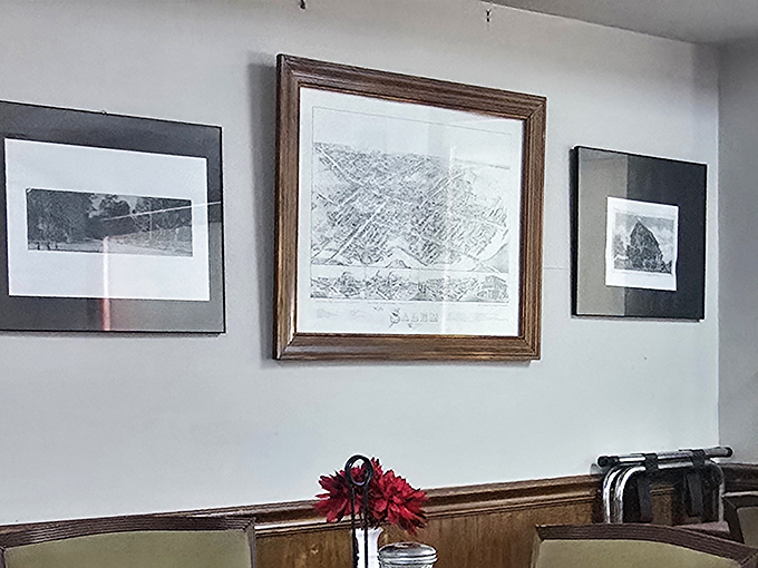 Wall art that tells Salem's story &ndash; historical maps and photographs that remind you this diner isn't just serving food, it's preserving community heritage.
