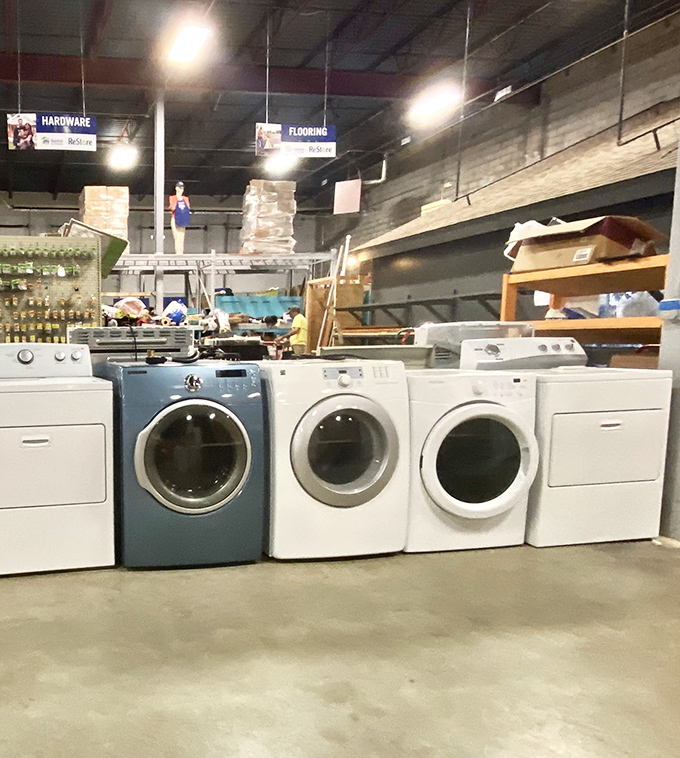 Washer wonderland where appliances get their second act. That blue front-loader has more life left than most Hollywood careers.