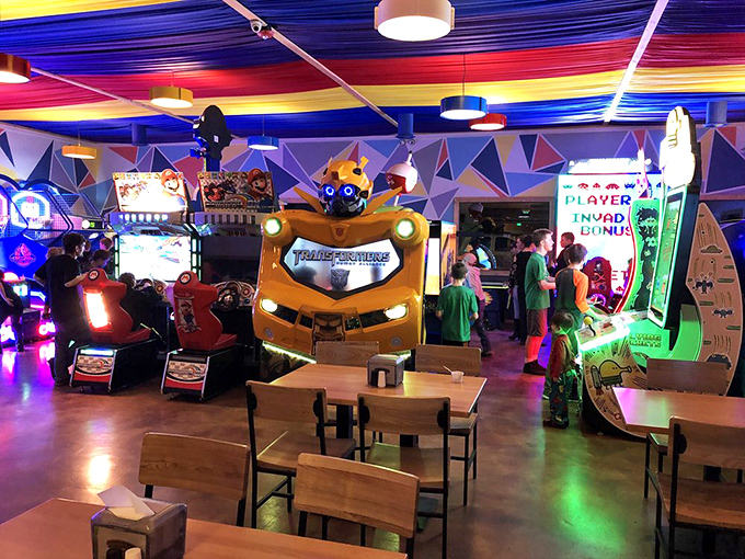 Not just a pizza place but an entertainment destination, where neon lights and arcade sounds create the perfect backdrop for family fun.