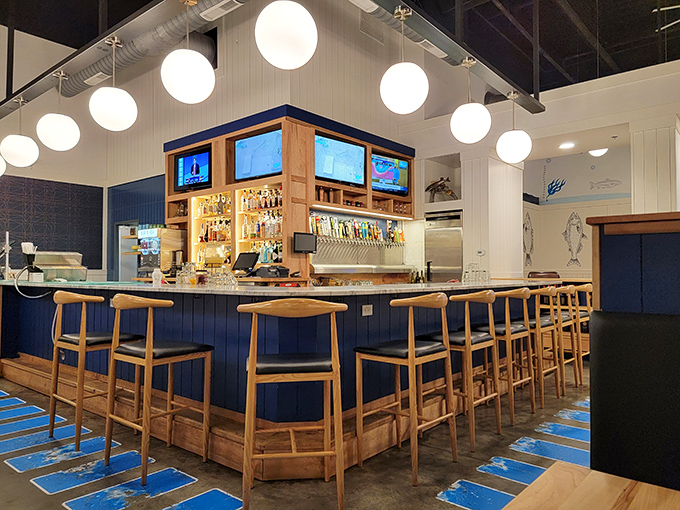 The bar area beckons with wooden stools and a impressive tap selection. Where beer meets fish in perfect harmony.