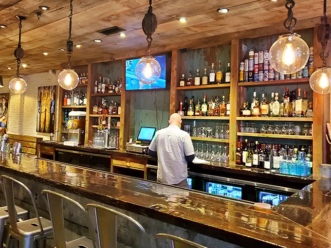 Not just a bar, but a liquid library of spirits. Where cocktail conversations flow as smoothly as the bourbon being poured.