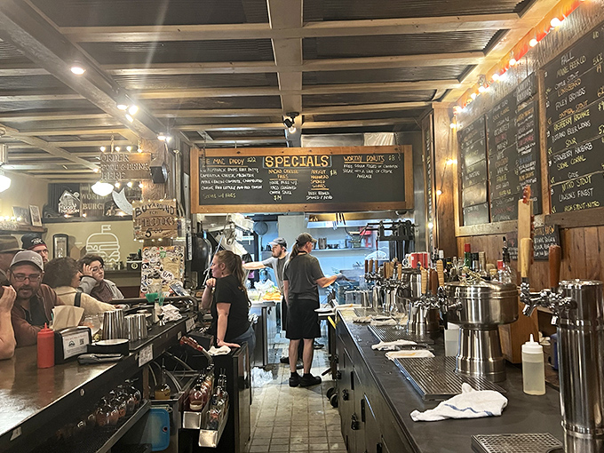 The bar area buzzes with energy as craft beers flow and locals mingle with pilgrims who've made the burger journey.