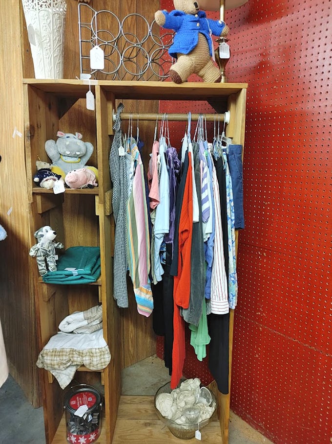 Fashion recycled and ready for new adventures. That blue teddy bear stands guard over clothing that's priced less than your morning coffee.