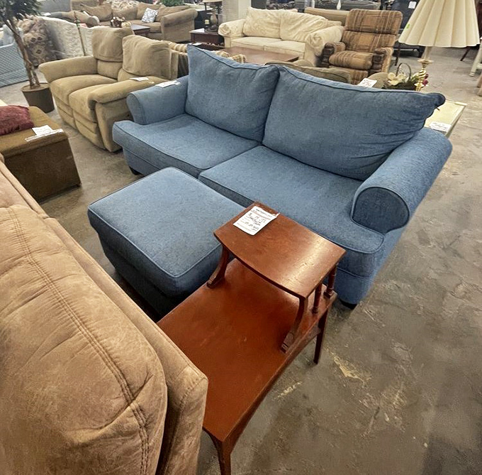 The couch section&mdash;a living room lineup where you might find your perfect match in this blue beauty with matching ottoman.