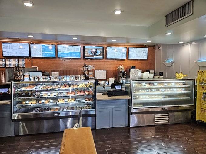 The bakery counter showcases a tempting array of pastries and pies, each one silently arguing why it should be your choice today.