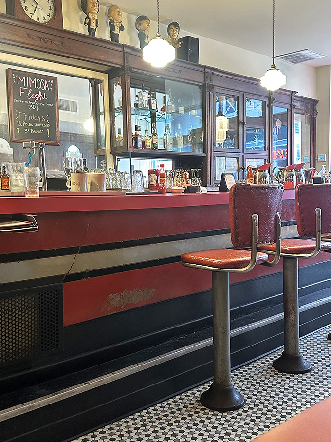 The counter where strangers become regulars and regulars become family. Note the vintage wooden cabinetry&mdash;they don't make 'em like this anymore.