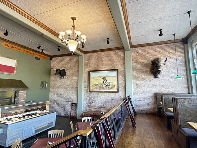 Exposed brick walls adorned with western art and mounted bison heads&mdash;a dining room that tells the story of the Panhandle with every detail.