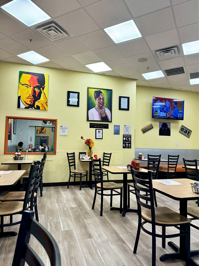 Vibrant artwork adorns sunny yellow walls, creating an atmosphere as warm and inviting as the food that keeps locals coming back.