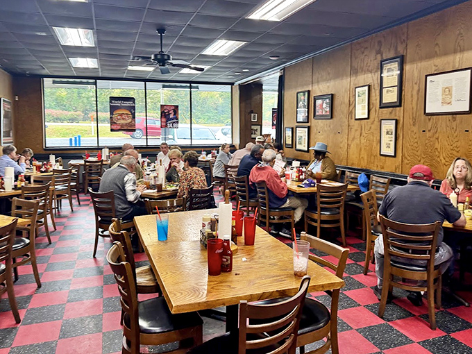 Families and friends gather around these tables, united by the universal language of exceptional barbecue and good company.