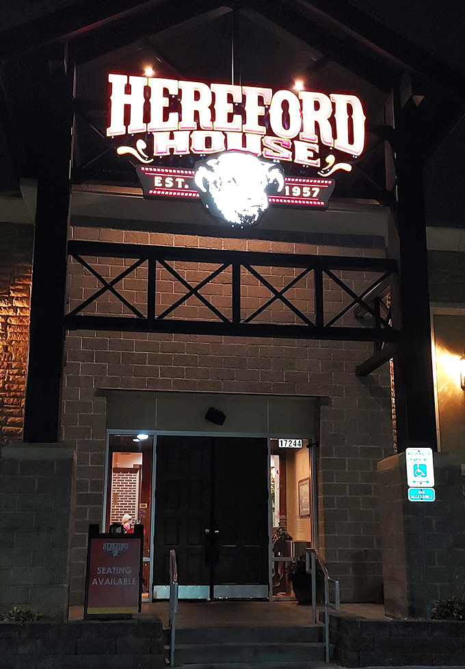 The evening glow transforms the entrance into a beacon for beef lovers—like a lighthouse, but for people hungry for steak instead of safe harbor.