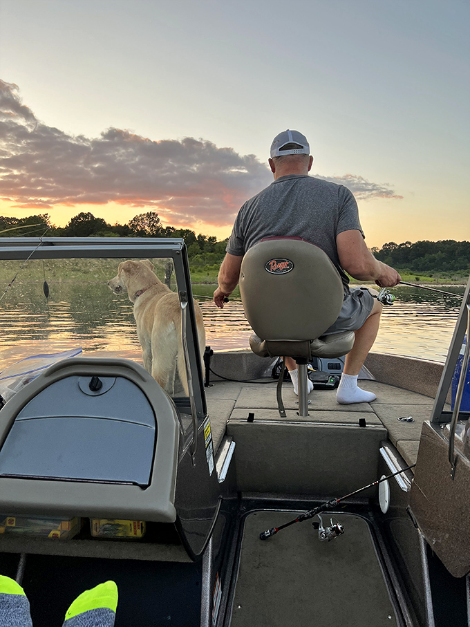 Man, dog, boat, sunset&mdash;sometimes life's perfect equation is that simple. Even the fish know to pause when the sky puts on this show.