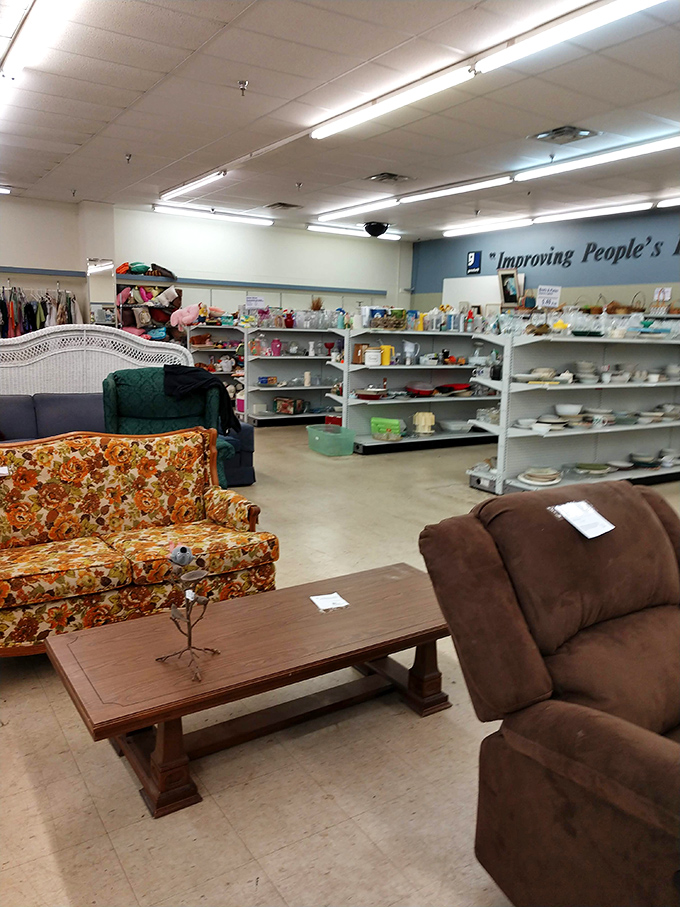 The furniture section showcases a retro floral sofa beside a sturdy coffee table&mdash;yesterday's living room ready for tomorrow's memories.