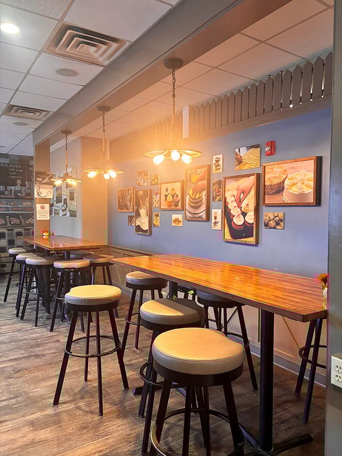The dining area feels like someone's Pinterest board came to life. Warm lighting, food photography that doesn't need filters, and counter seating perfect for solo pizza pilgrimages.