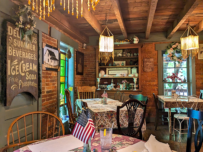 Vintage signs, stained glass windows, and pendant lights create an atmosphere that's equal parts nostalgia and Instagram-worthy charm.