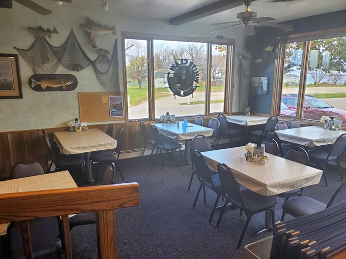 Fishing nets and natural light create the perfect backdrop for conversations that flow as easily as the old fashioneds at this lakeside dining room.
