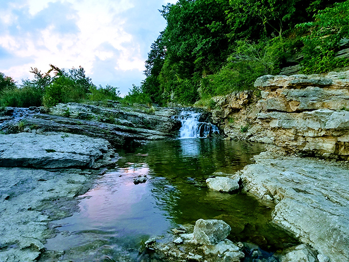 Water-sculpted limestone tells Iowa's ancient oceanic history, creating natural infinity pools that would make Hollywood designers jealous.