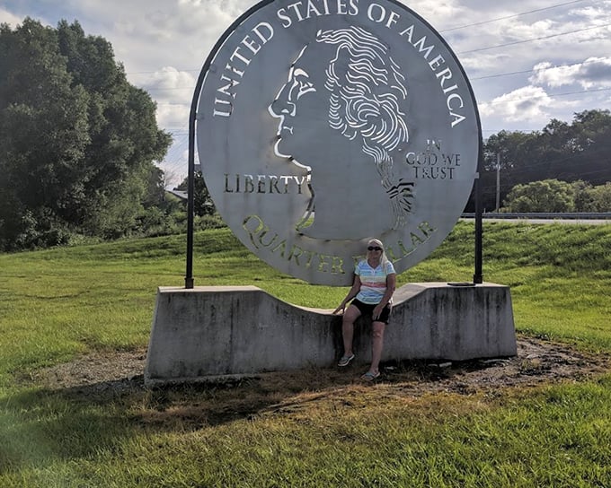 Summer's greenery provides the perfect backdrop for this metallic marvel, where visitors can literally sit with American history.