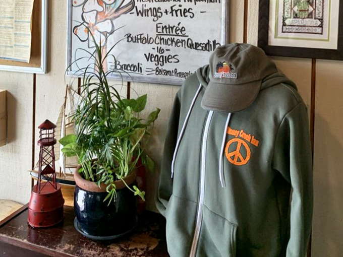 That peace-symbol hoodie isn't just merch&mdash;it's a philosophy at Stoney Creek, where good food brings everyone together.