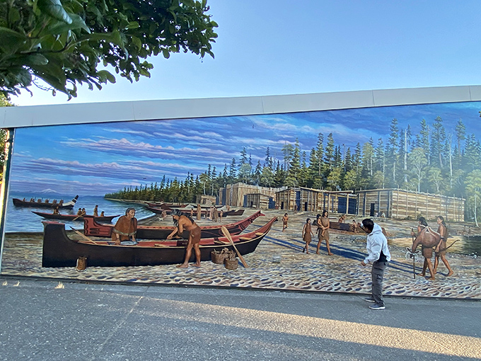 History painted large – this mural captures the indigenous maritime heritage that shaped the Olympic Peninsula long before European settlers arrived.
