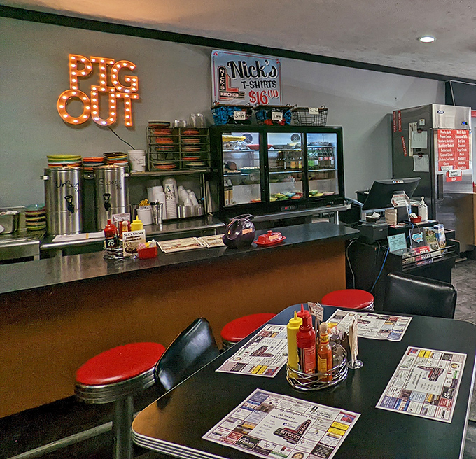 The counter area where magic happens&mdash;classic diner stools invite you to spin slightly while waiting for your tenderloin, just as generations before you have done.