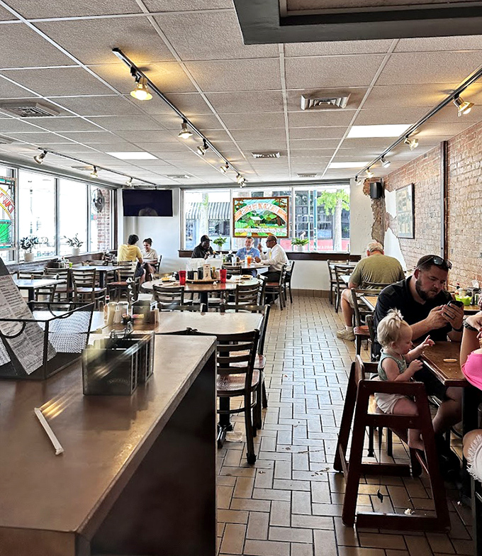 Brick walls and tile floors set the unpretentious stage where breakfast dreams come true for families, friends, and first-timers alike.