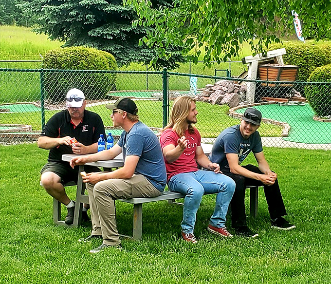 The post-race debriefing area, where friendly trash talk and "I almost had you" stories are exchanged over cold drinks.