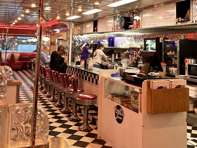 Behind the checkered counter, the staff orchestrates the daily symphony of sizzles, clinks, and satisfied sighs that is the soundtrack of diner life.