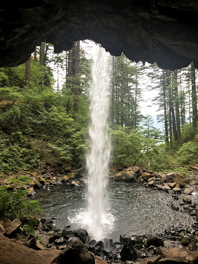 Behind the waterfall&mdash;nature's perfect photo frame where you can literally stand behind thousands of gallons of falling water. Mind-blowing!