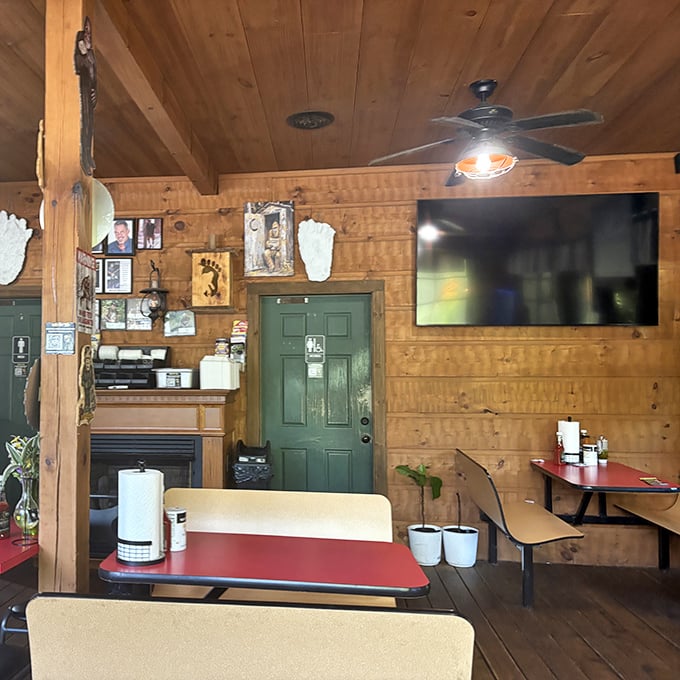 Red-topped tables against warm wood paneling create the perfect rustic atmosphere for contemplating whether you can finish your sasquatch-sized meal.