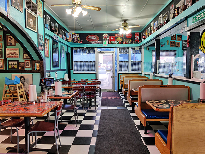 The checkered floor and booth seating create the perfect backdrop for breakfast theater, where every table tells its own delicious story.
